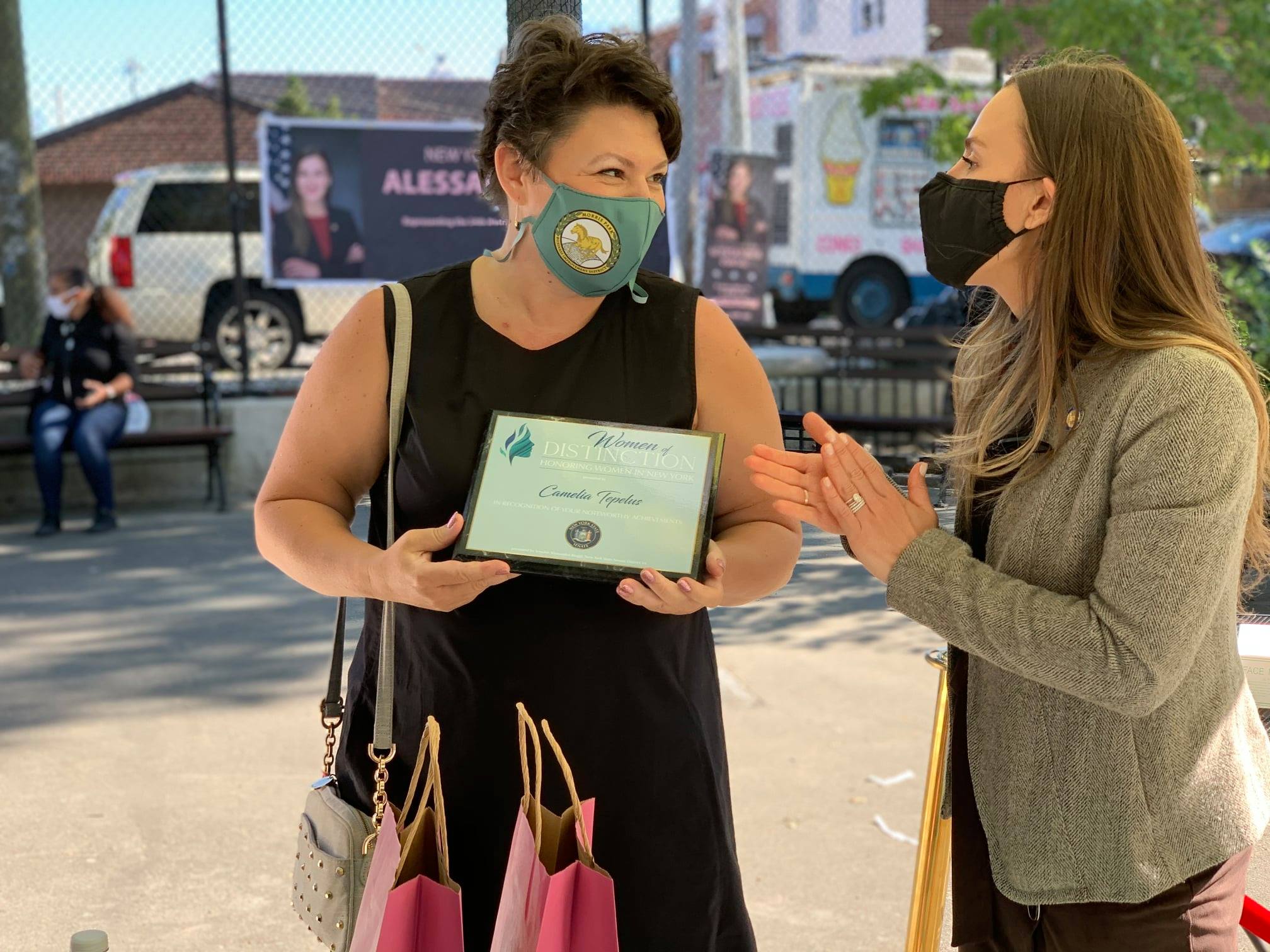 Senator Biaggi presents the Senate Women of Distinction award ...