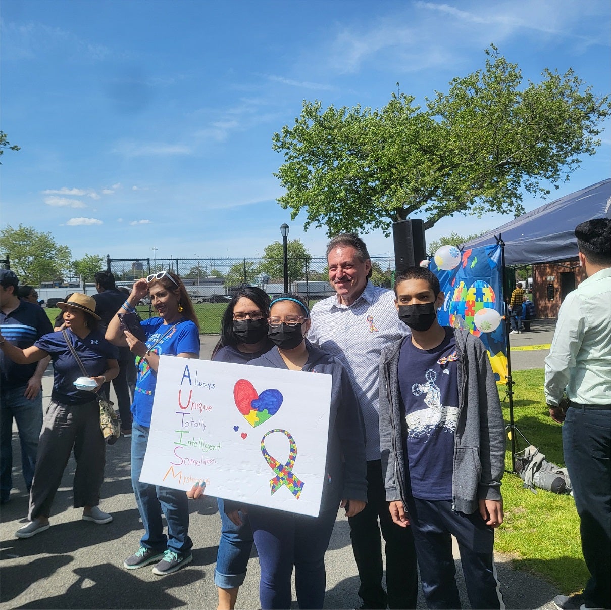 Over 100 walk around Smokey Oval to show support for those with autism ...