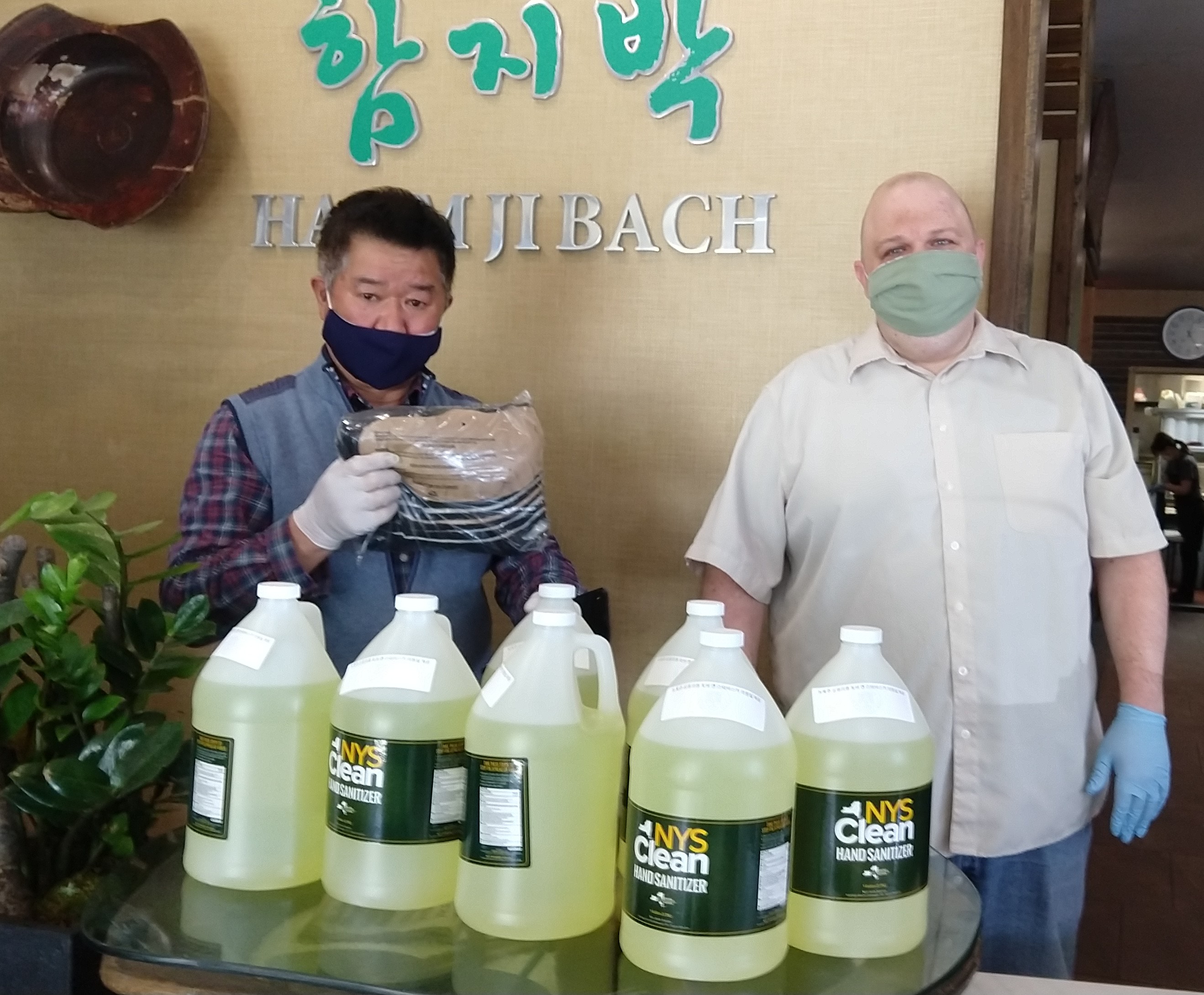 Senator Toby Ann Stavisky provides hand sanitizer and safety masks to ...